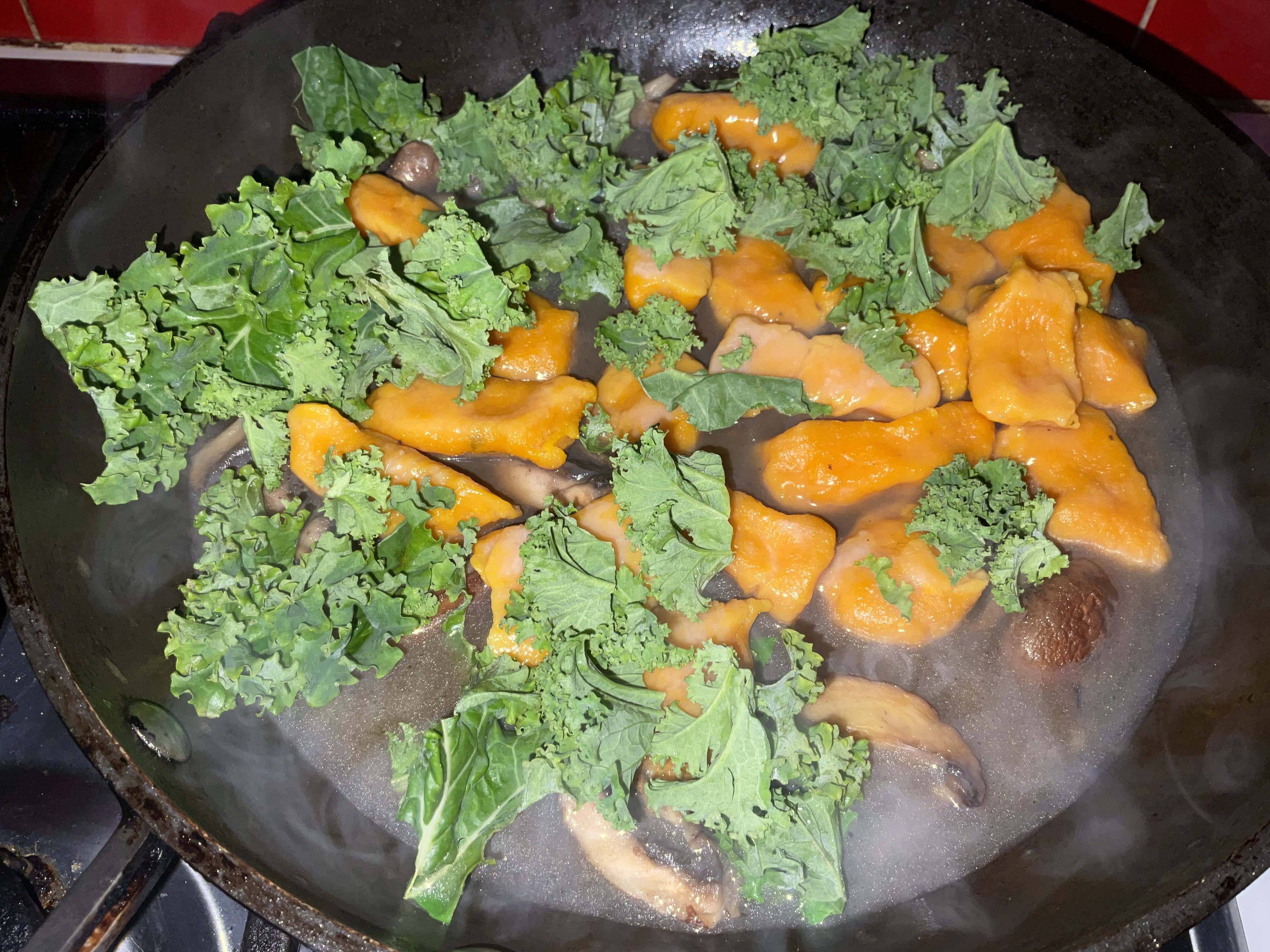 Squash Gnocchi with Black Pudding, Mushroom and Kale