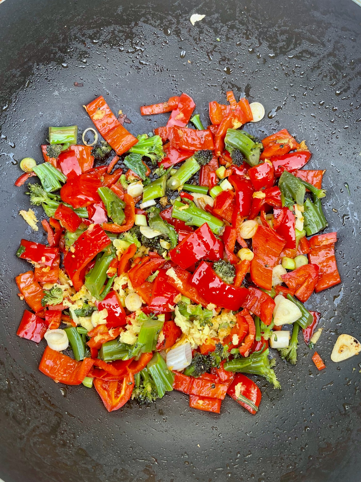 Stir Fried Pork Fillet with Peppers, Nuts, Mint, Basil and Broccoli