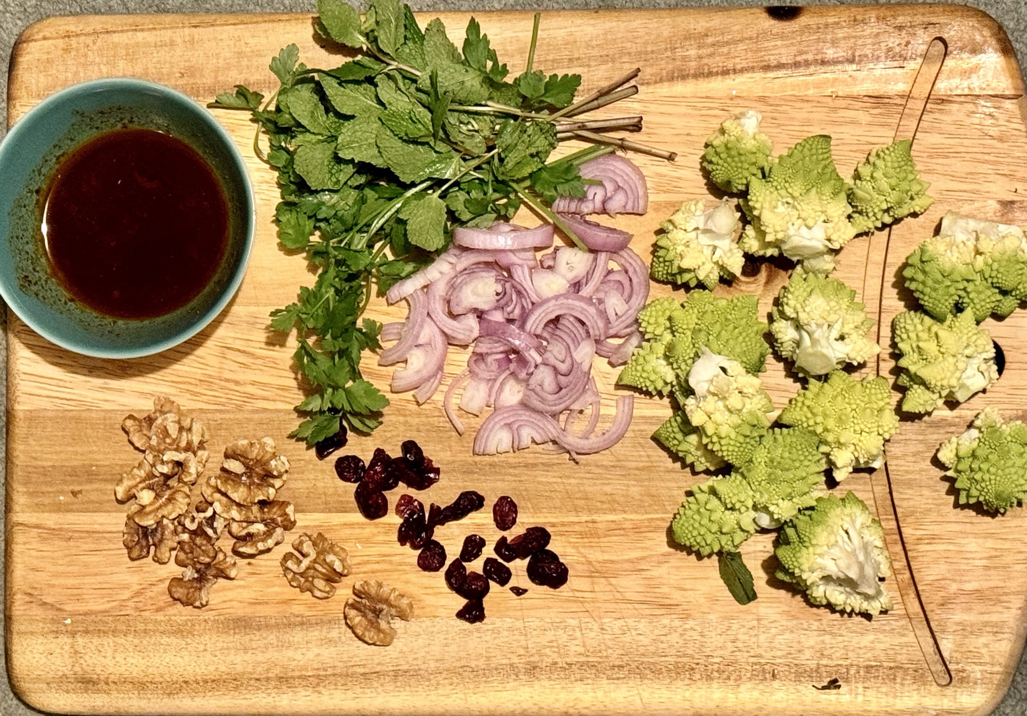 Dukkha Crusted Lamb on Warm Hummus Served with Harissa Roasted Romesco ...