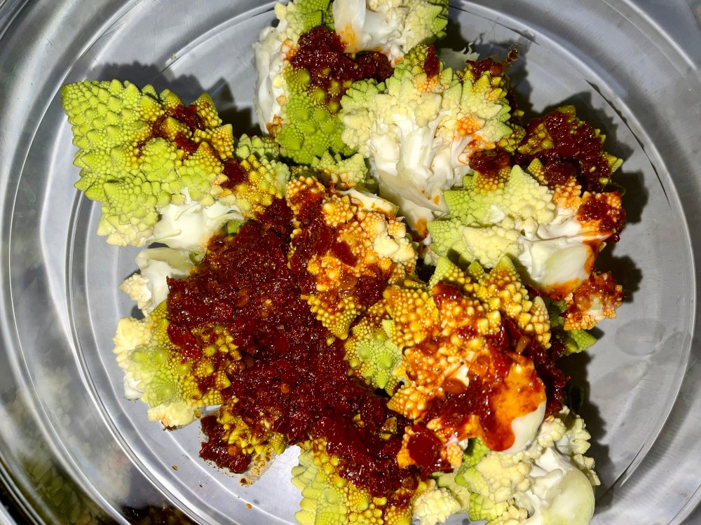 Dukkha Crusted Lamb on Warm Hummus Served with Harissa Roasted Romesco ...