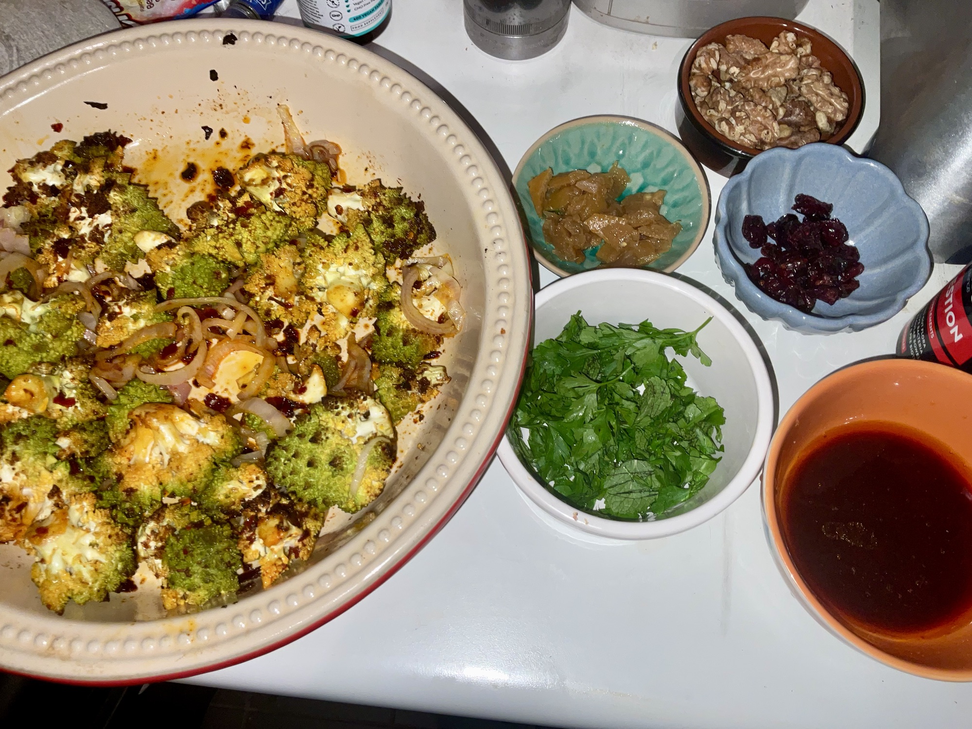 Dukkha Crusted Lamb on Warm Hummus Served with Harissa Roasted Romesco ...
