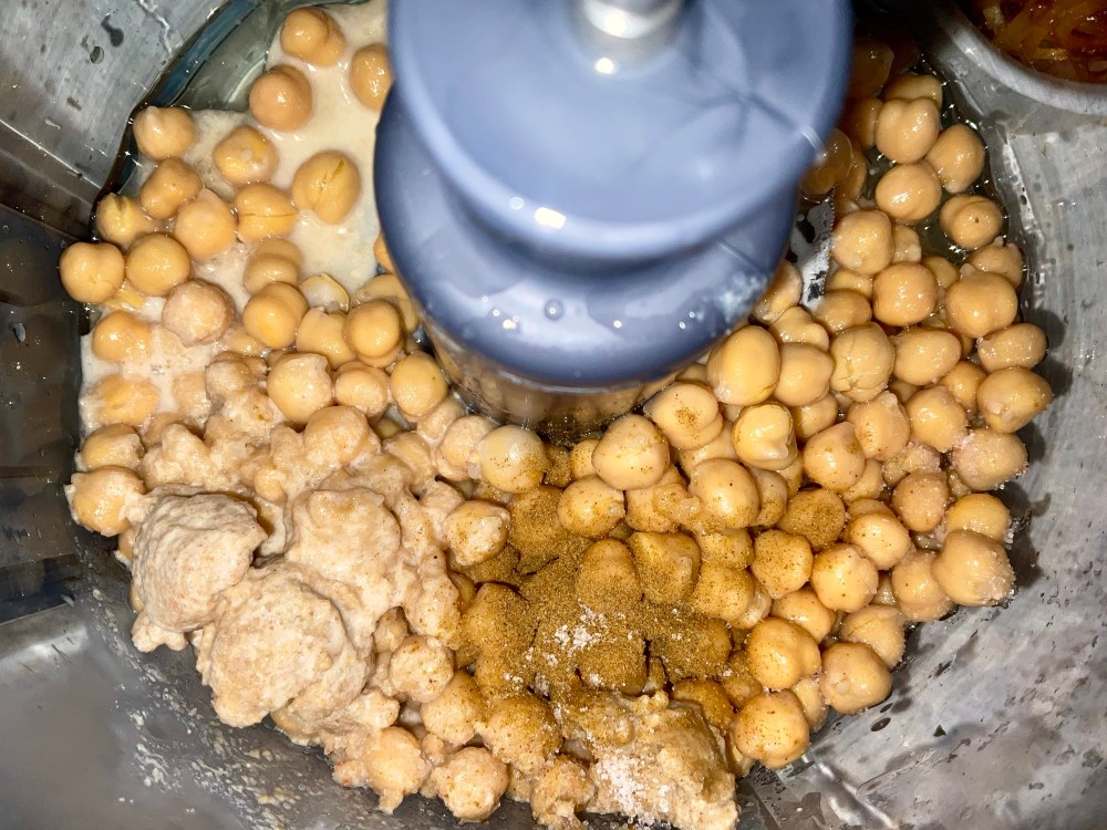 Dukkha Crusted Lamb on Warm Hummus Served with Harissa Roasted Romesco ...